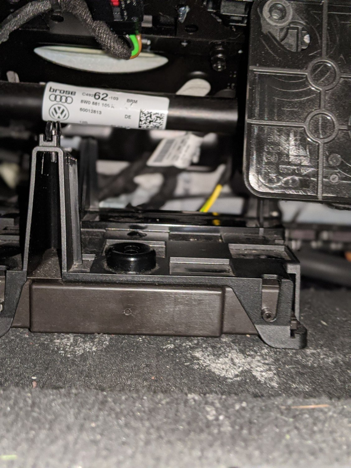 Loose module under driver seat - AudiWorld Forums