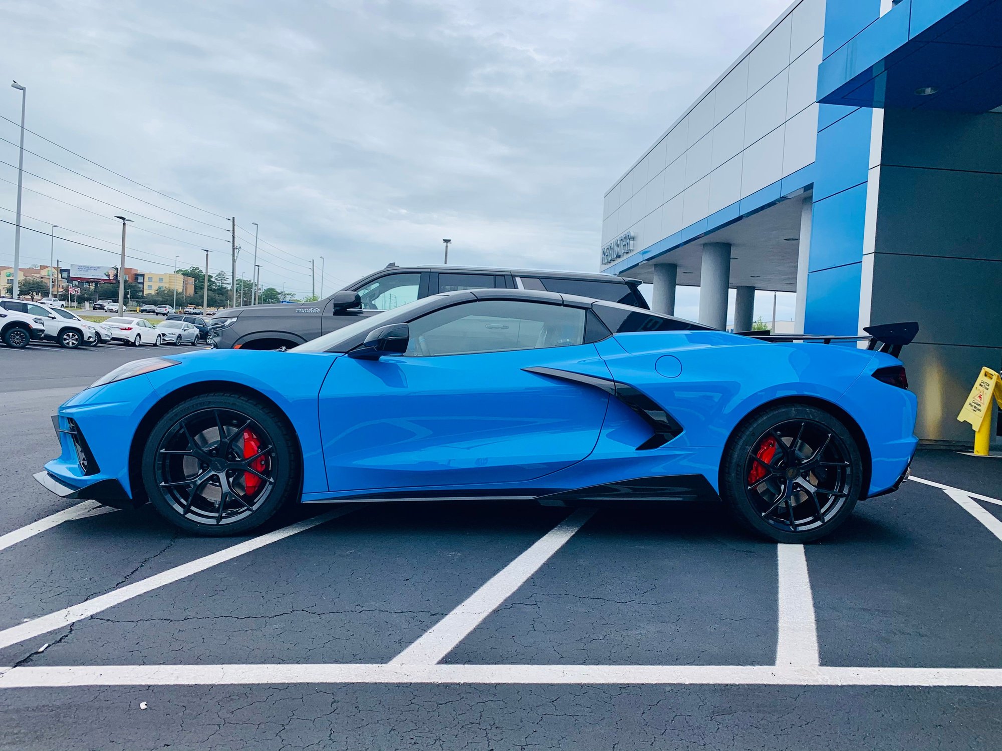 Looking for pictures of black aftermarket wheels for rapid blue c8 ...