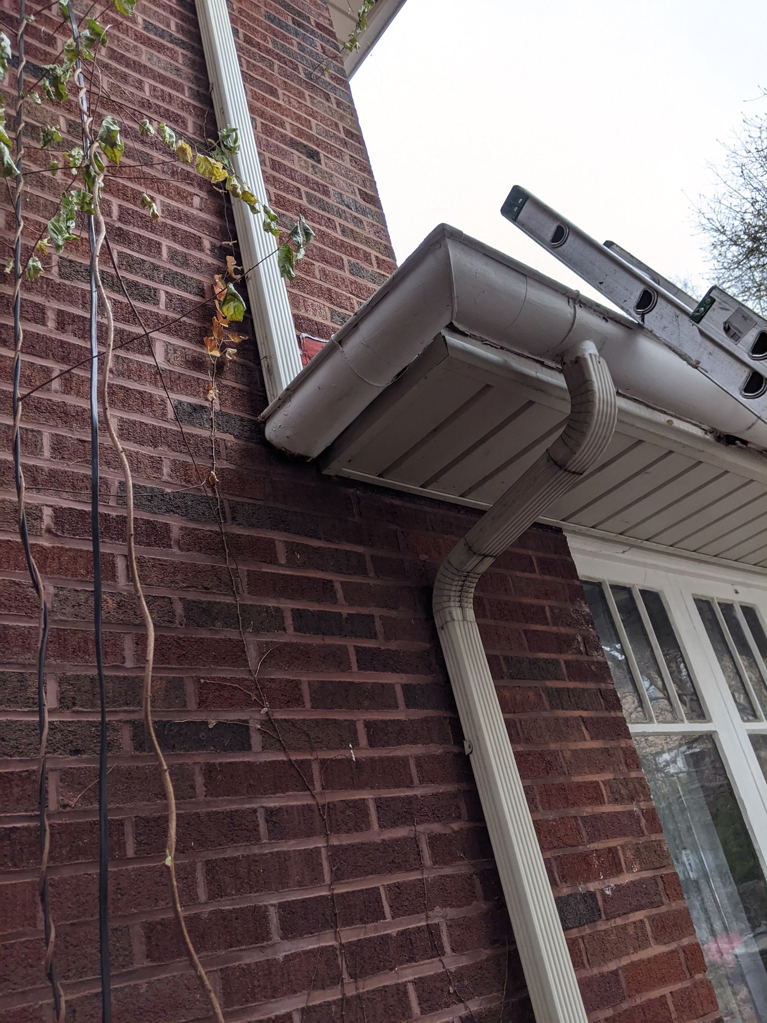 upper downspout overwhelms the corner of a gutter - DoItYourself.com Community Forums