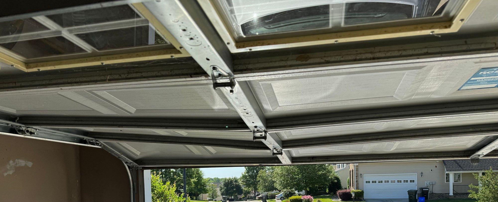 Garage door buckled - DoItYourself.com Community Forums