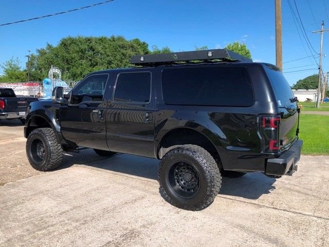 2002 7.3 4x4 with McNeil Racing kit....Pirate4x4_camo Procomp lift ...