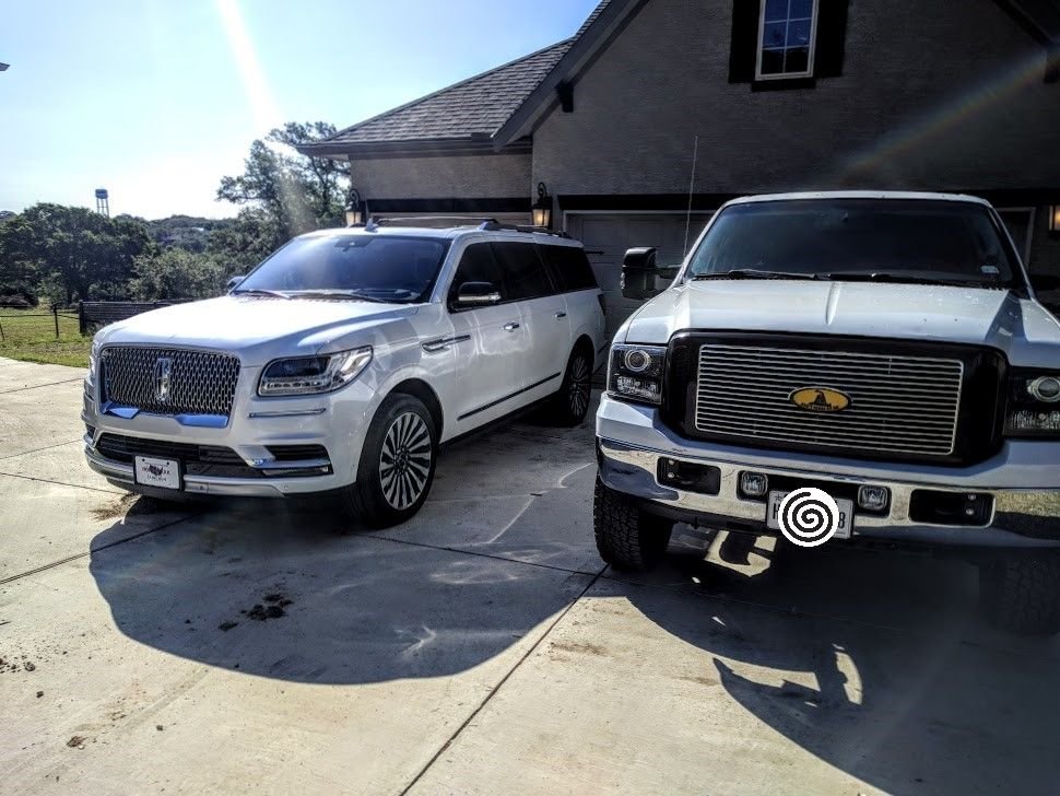 Next to the new Navigator, the Excursion still holds up - Ford Truck ...